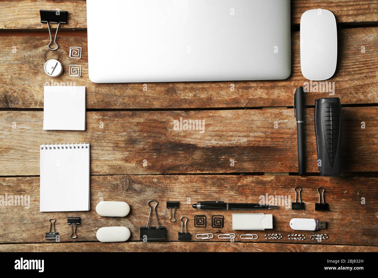 Set of office stationery with a computer on a wooden background with a ...
