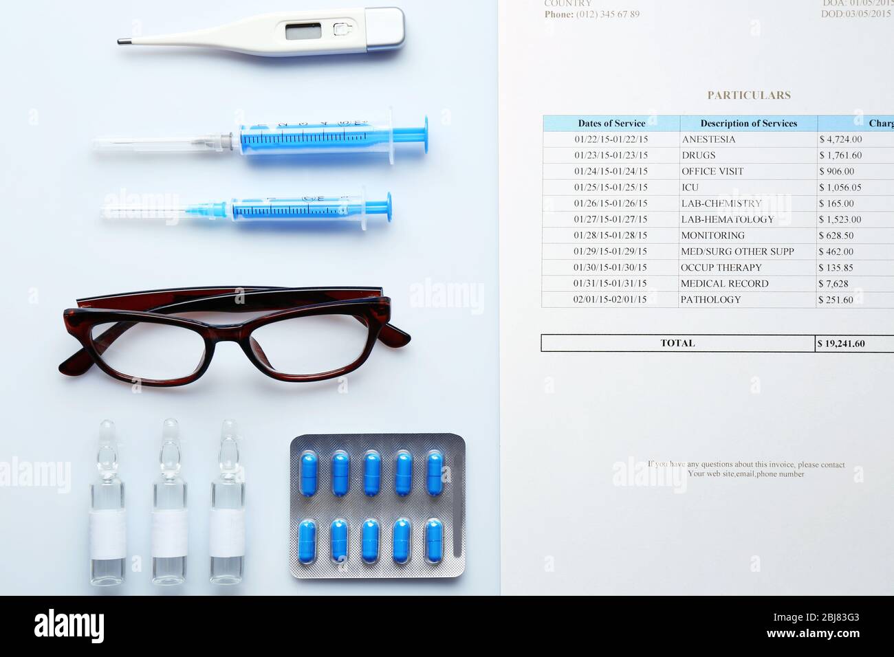 Doctor table with medical items, top view Stock Photo - Alamy