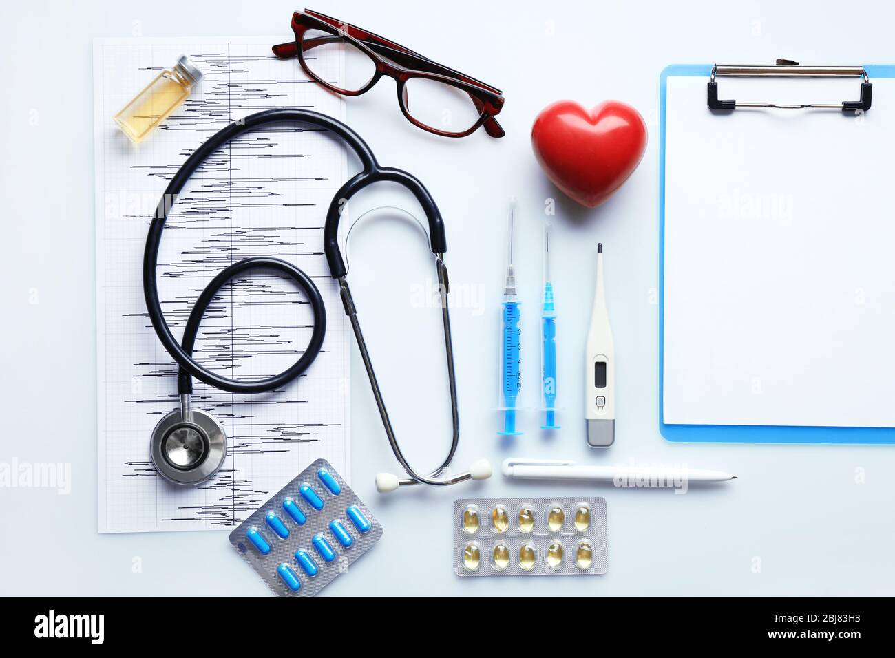 Doctor table medicines glasses hi-res stock photography and images - Alamy