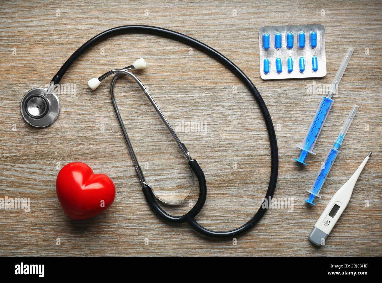 Doctor table with medicines and stethoscope, top view Stock Photo - Alamy