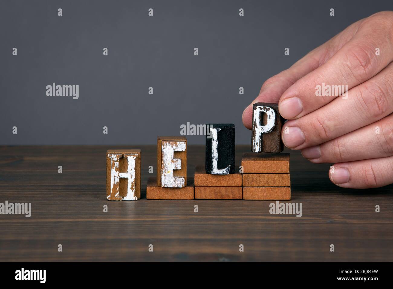 HELP. Support, stress and health concept. Wooden alphabet letters on ...
