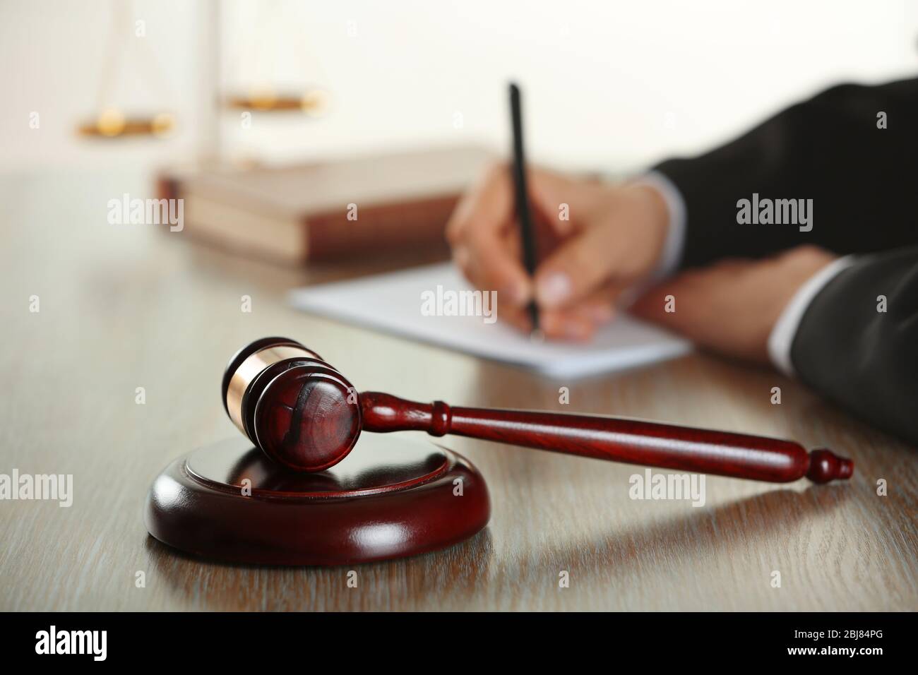 Judge writing on paper hi-res stock photography and images - Alamy