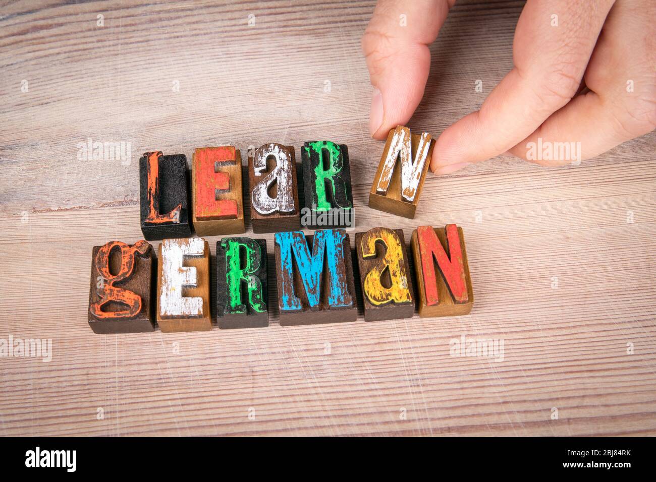 LEARN GERMAN. Language training, skills and education concept. Colored ...
