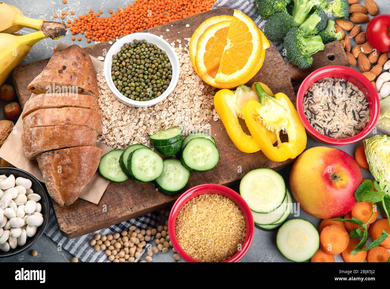 Foods high in carbohydrates on grey background. Vegan Foods high in ...