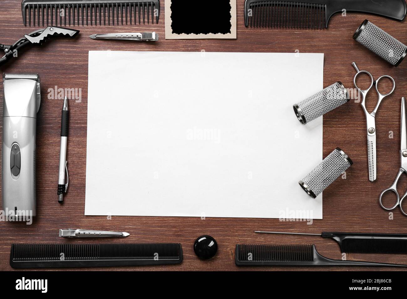 Clean sheet of paper, barber set with equipment and tools on wooden ...