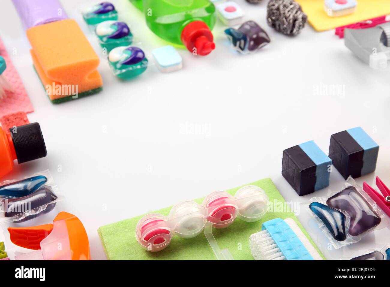 Frame of cleaning products and tools on white background Stock Photo ...