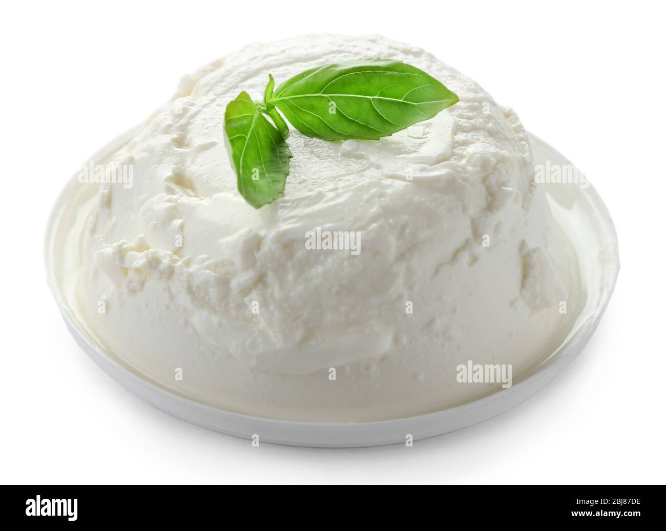 Thick cream with basil, isolated on white Stock Photo - Alamy