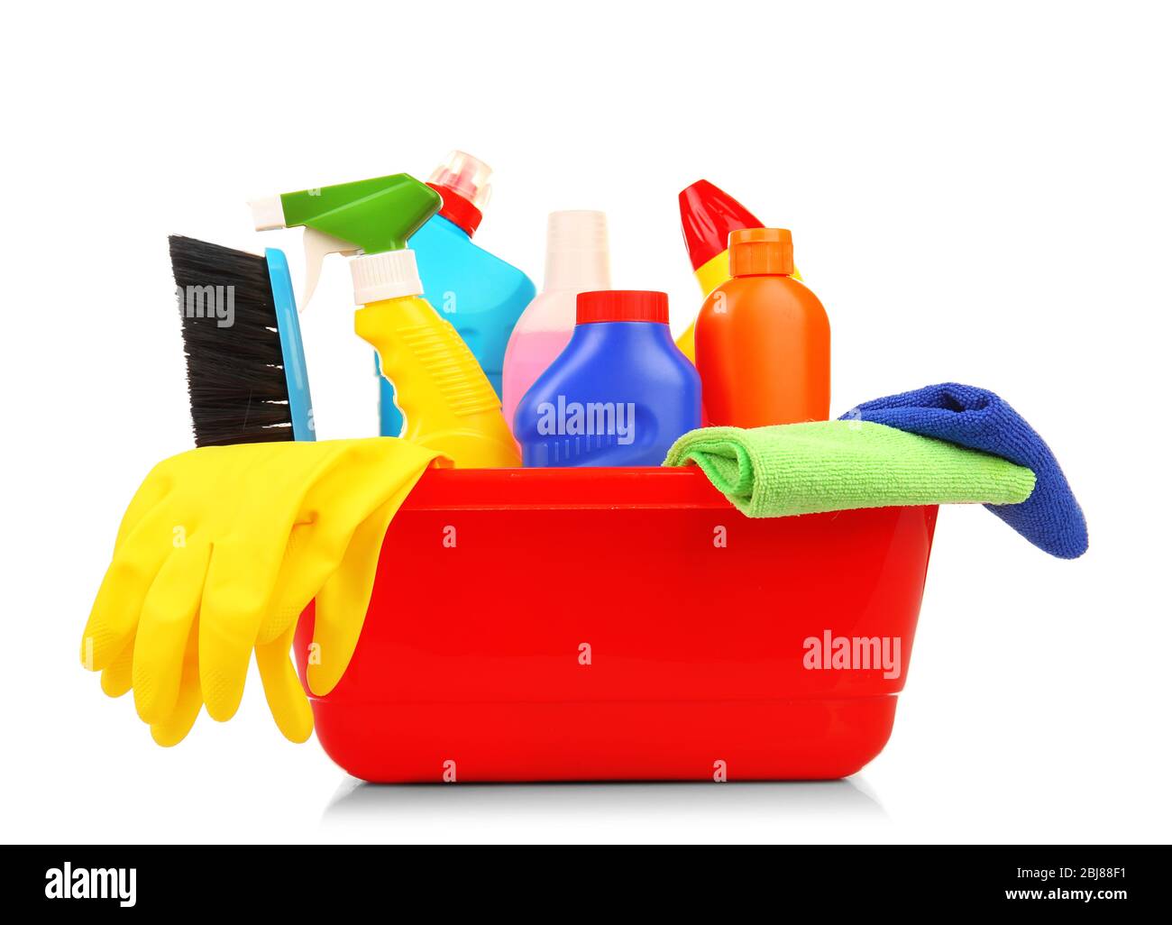 Cleaning set with tools and products in plastic tub, isolated on white ...