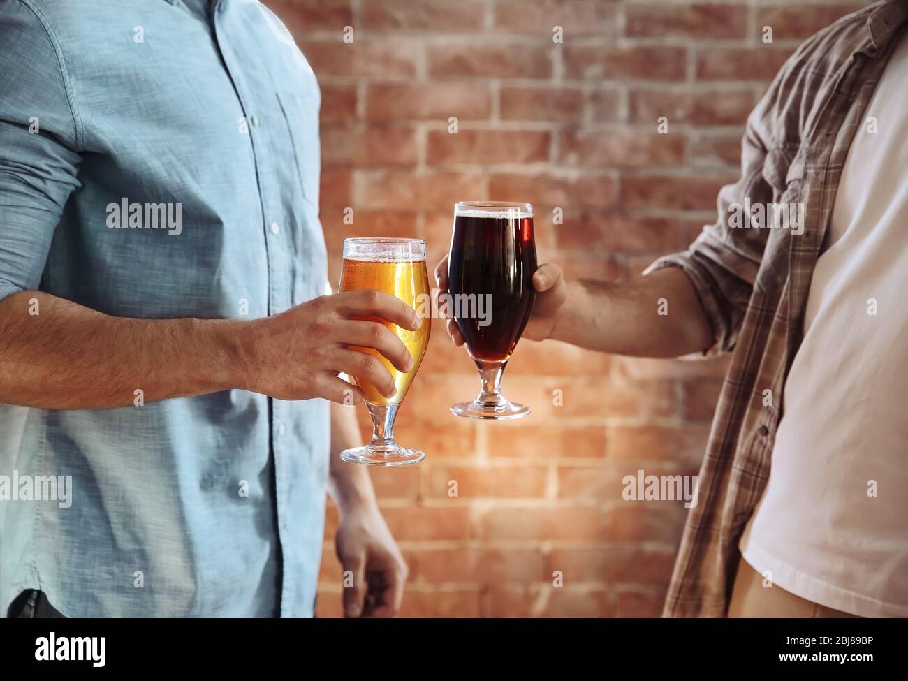 Two men clinking hi-res stock photography and images - Alamy