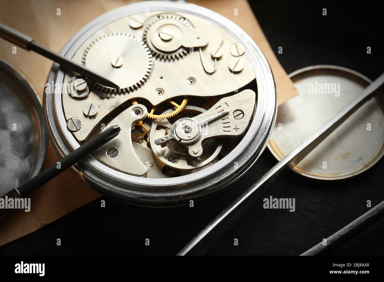 Mechanism of retro watch closeup Stock Photo - Alamy