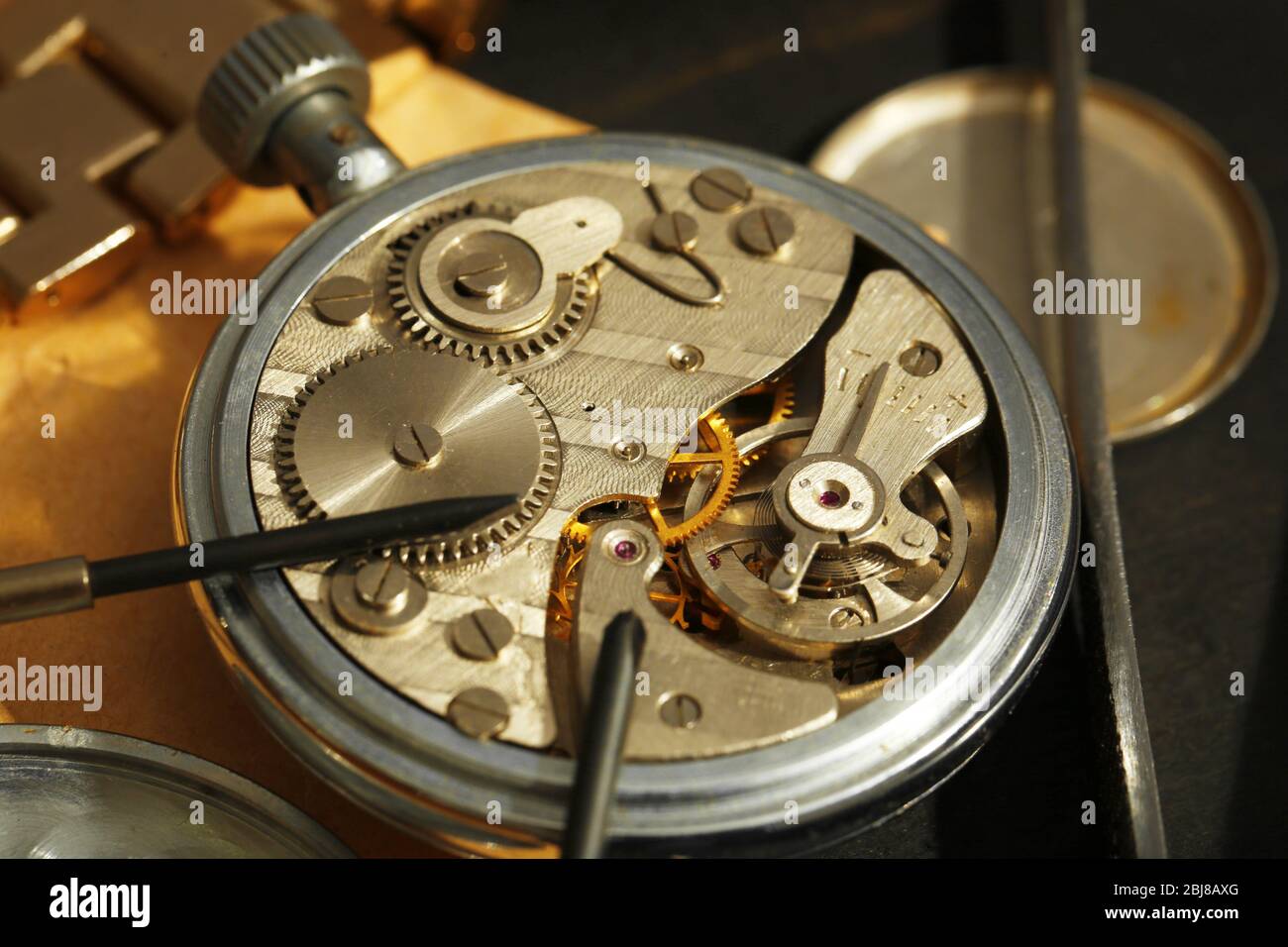 Mechanism of retro watch closeup Stock Photo - Alamy