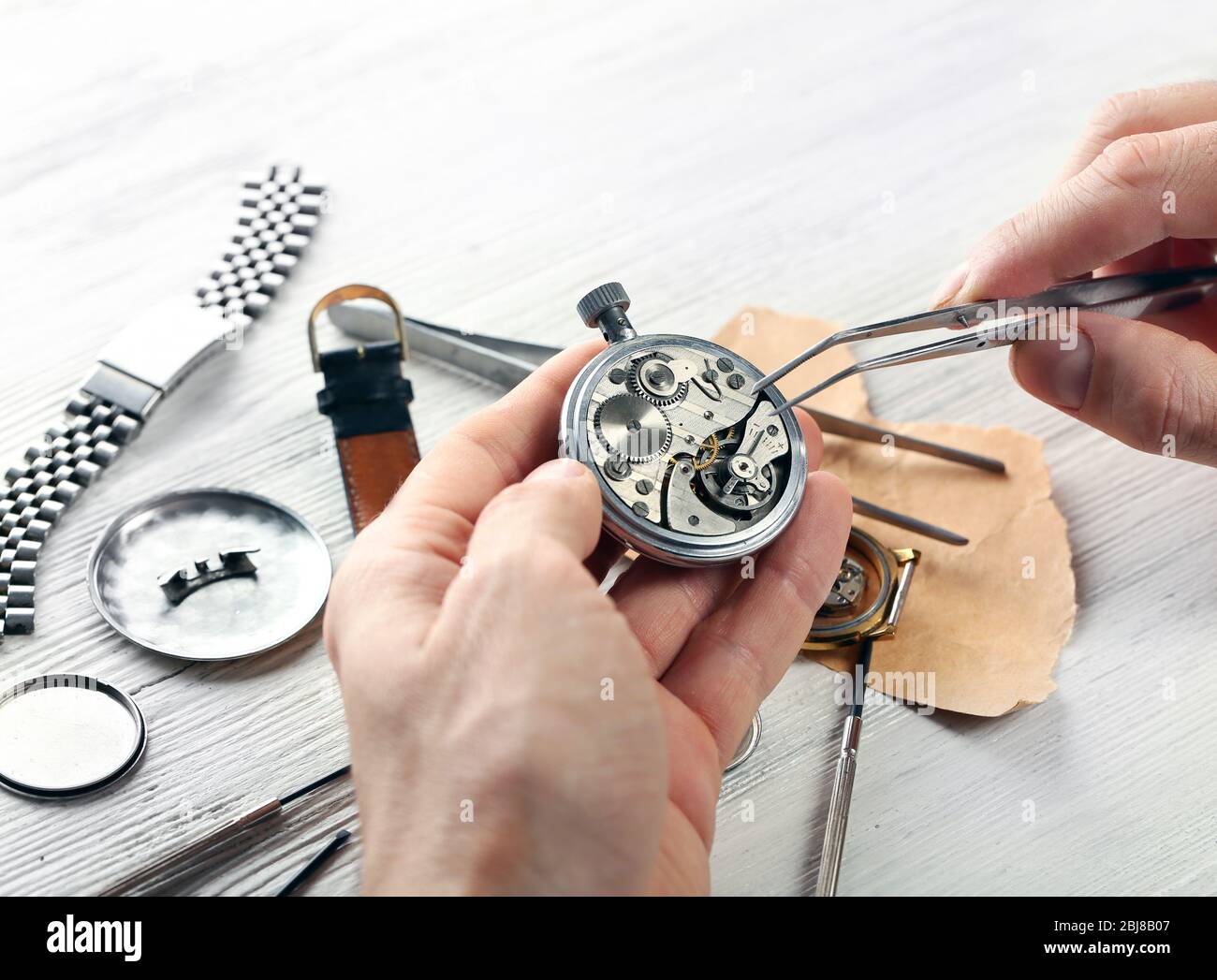 Mechanical wooden man clock hi-res stock photography and images - Alamy