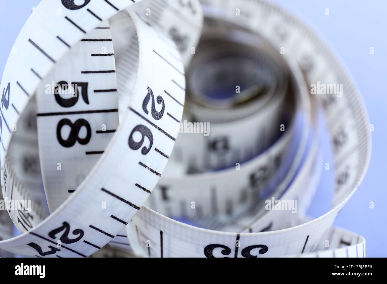 Purple measuring tape hi-res stock photography and images - Alamy