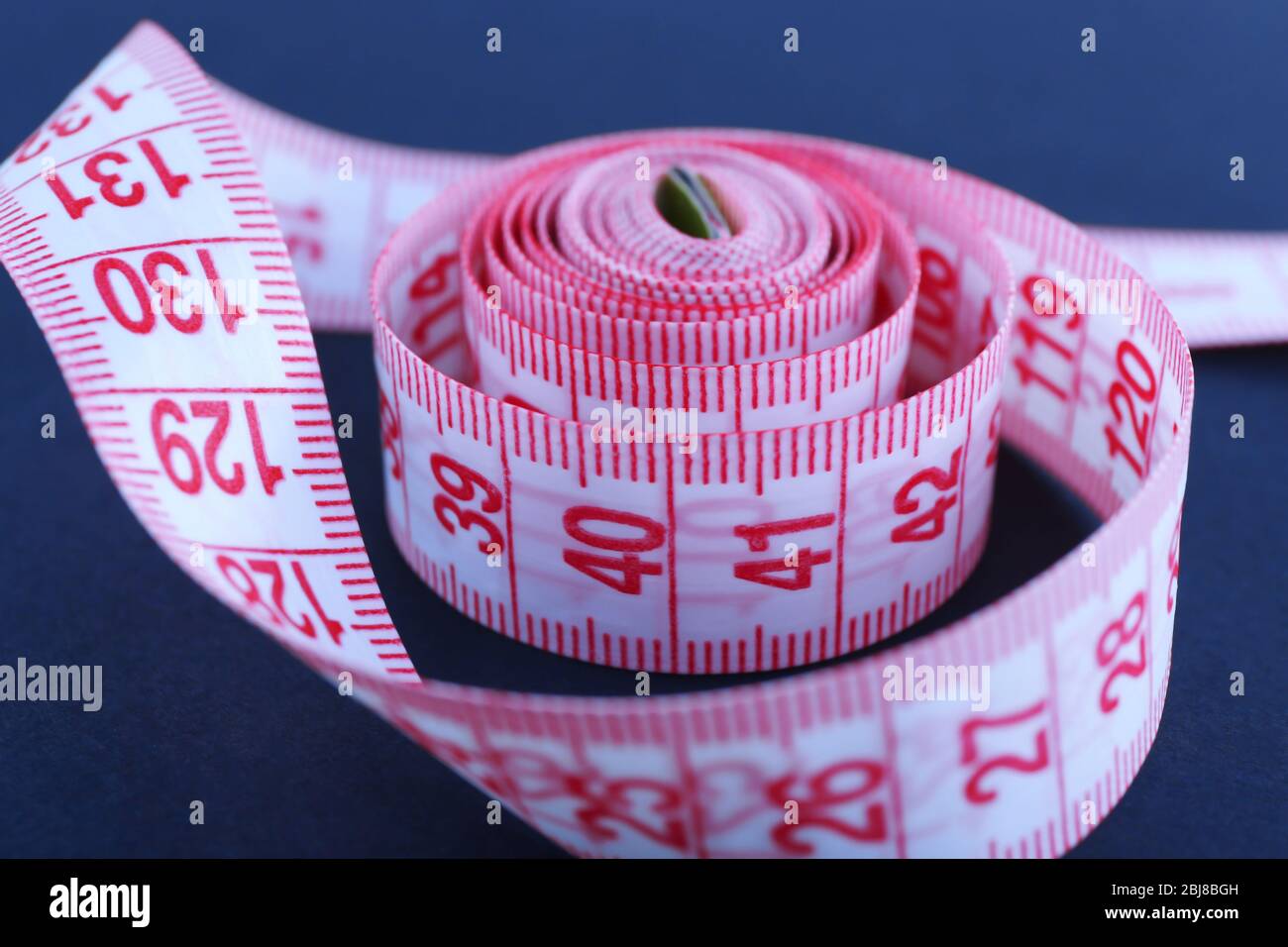 Inch scale pink measuring tape hi-res stock photography and images - Alamy
