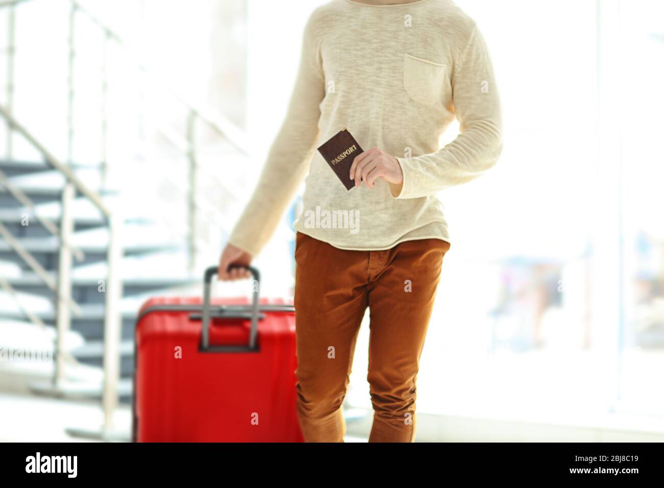 Person with hands holding large object hi-res stock photography and ...