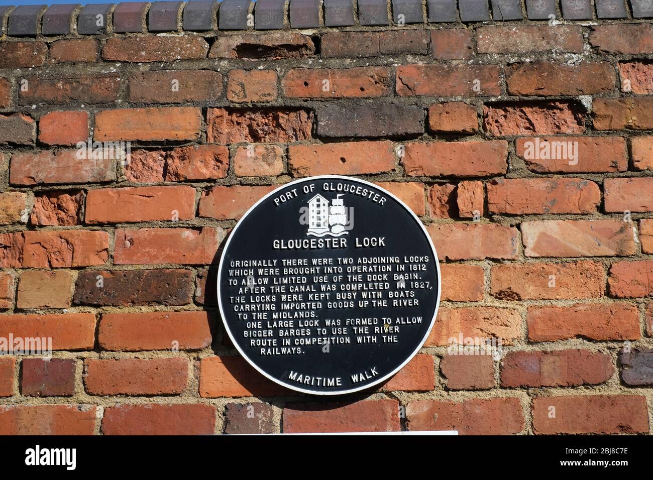 Gloucester's histroic docks in south-west England. Signage at the lock ...