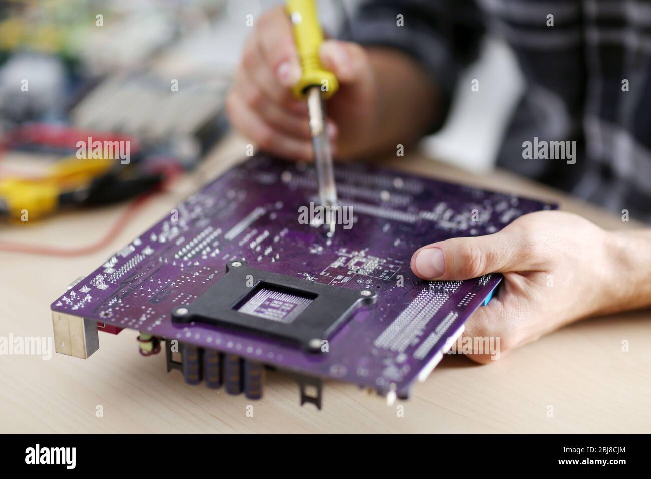Professional engineer repair computer details Stock Photo - Alamy