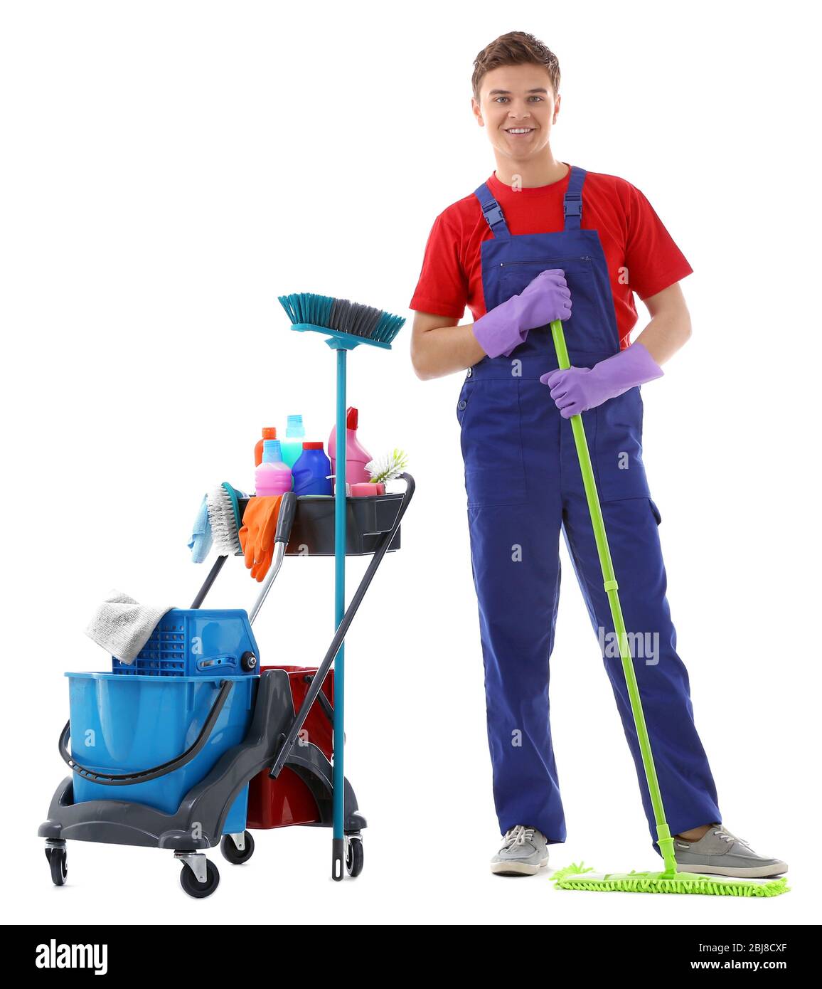 Young janitor with cleaner cart, isolated on white Stock Photo - Alamy