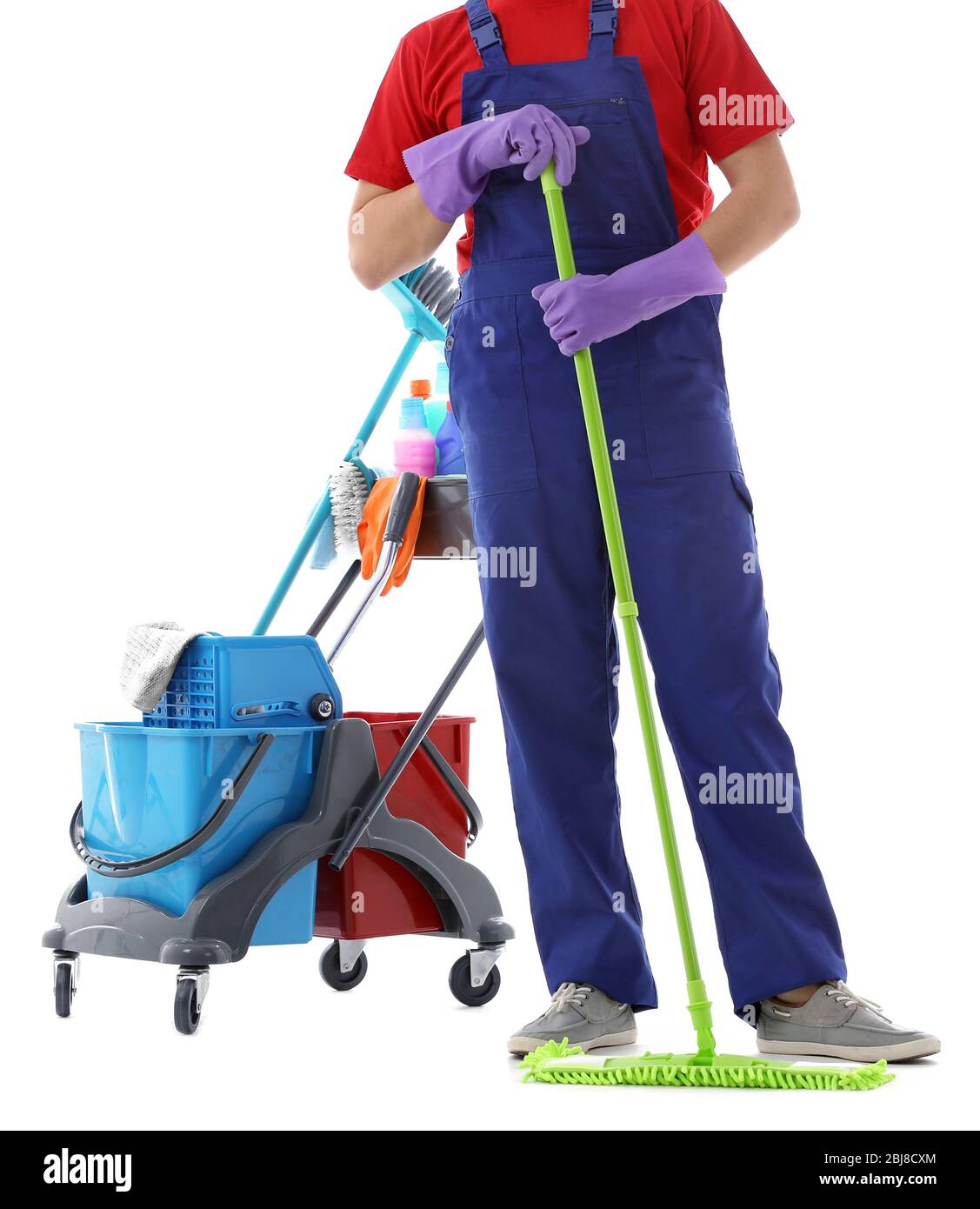 Young janitor with cleaner cart, isolated on white Stock Photo - Alamy