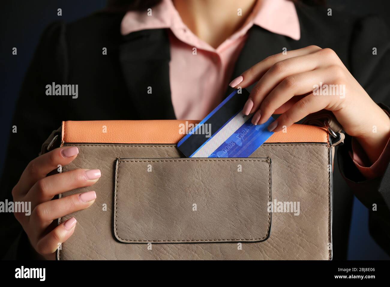 Putting Money In Purse High Resolution Stock Photography and Images - Alamy