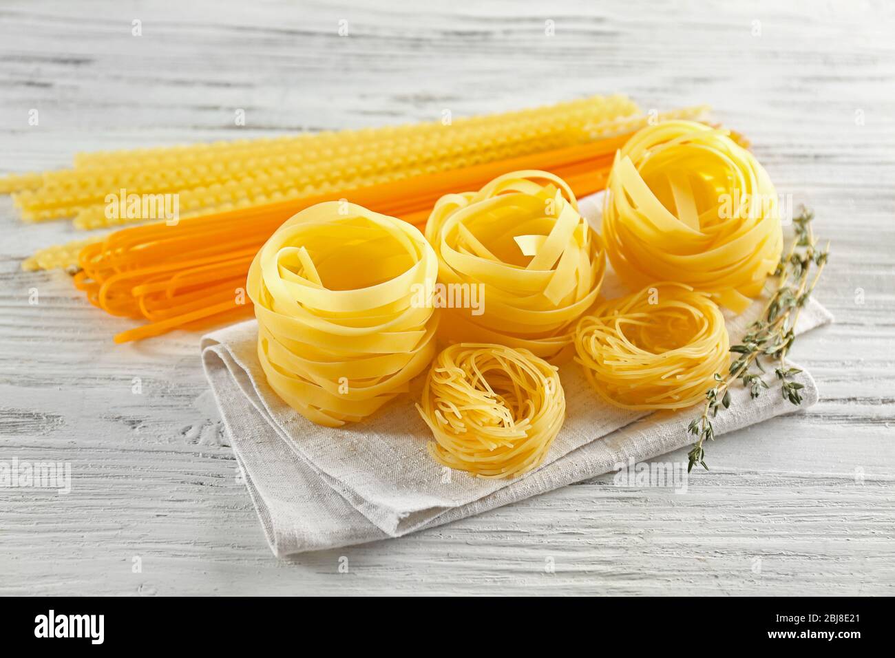 Tagliolini pasta raw uncooked hi-res stock photography and images - Alamy