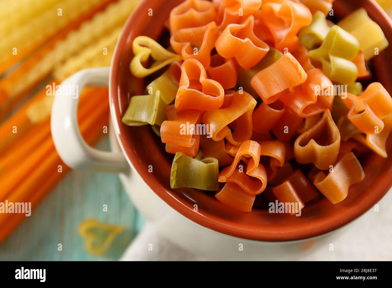 Different types of pasta in pan closeup Stock Photo - Alamy