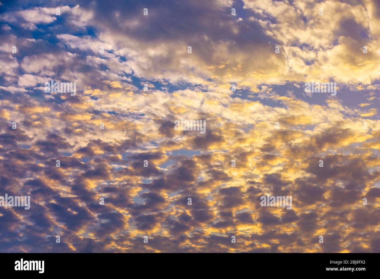 Cloudy tropical sky Stock Photo - Alamy