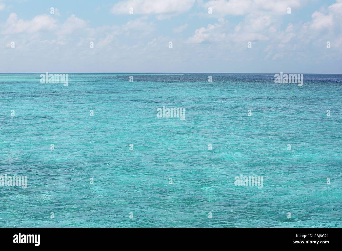 View of blue clear ocean water Stock Photo - Alamy