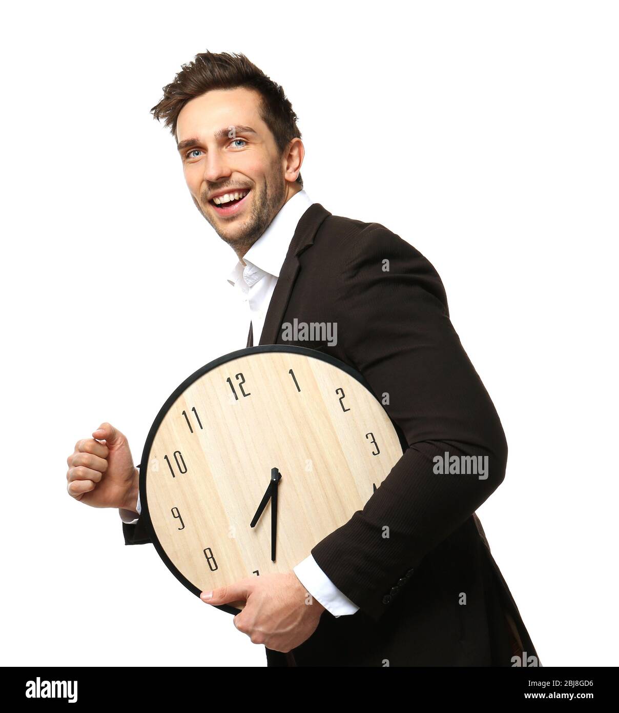 Man in black suit holding big clock is late for work on white ...