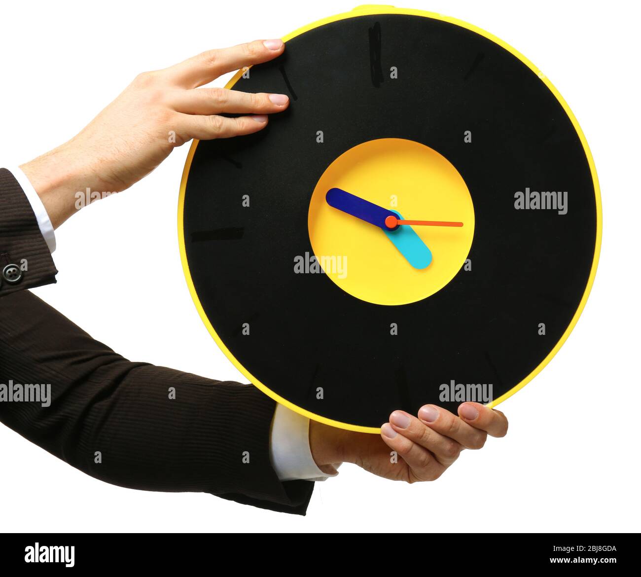 Male hands holding big clock on white background Stock Photo - Alamy