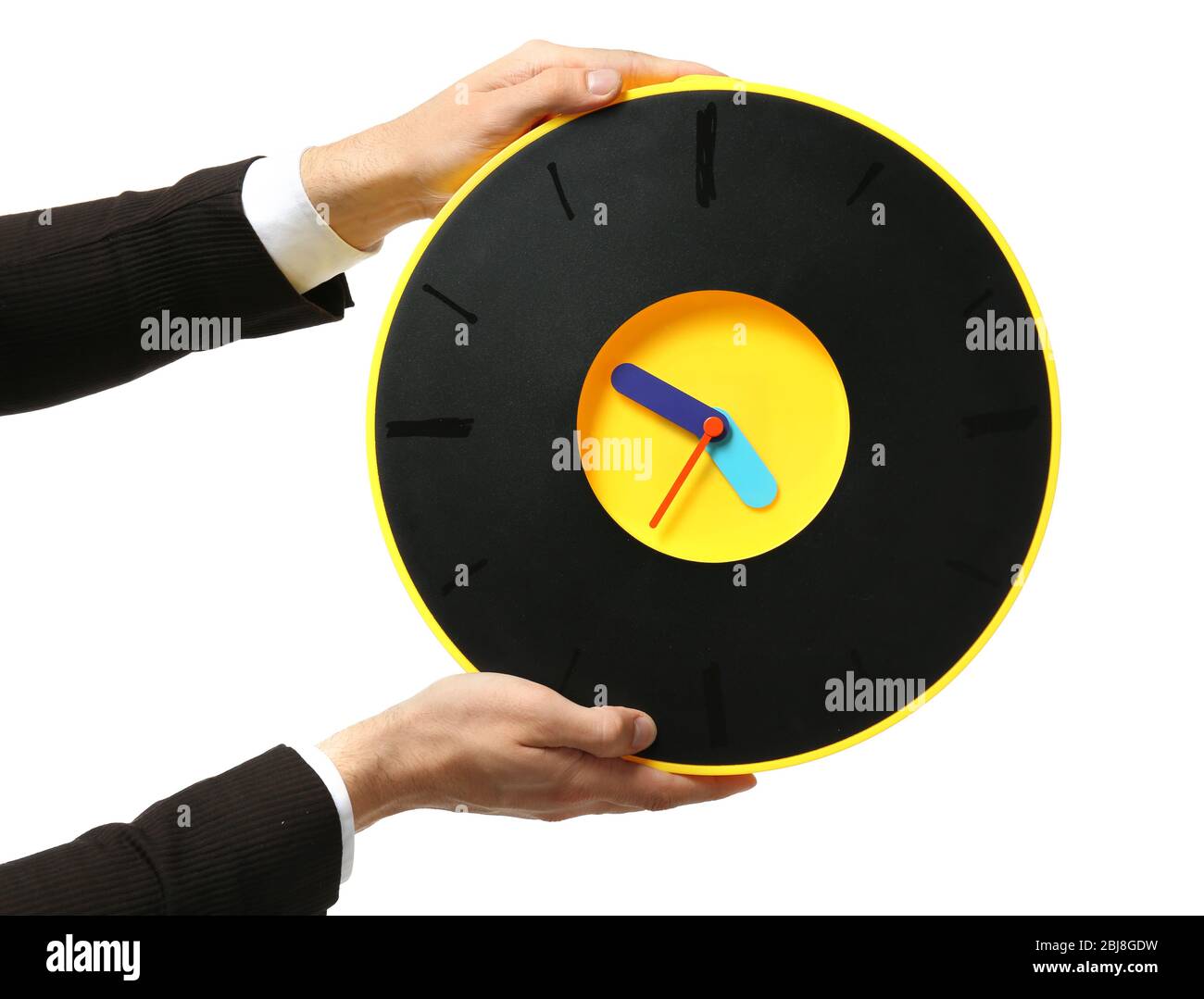Male hands holding big clock on white background Stock Photo - Alamy
