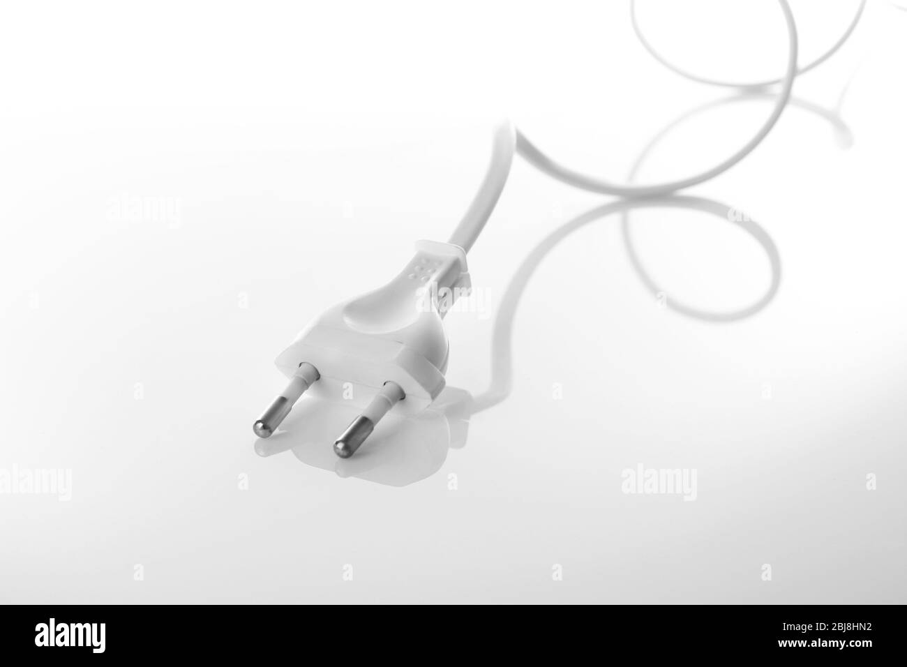 Power plug isolated on white Stock Photo - Alamy