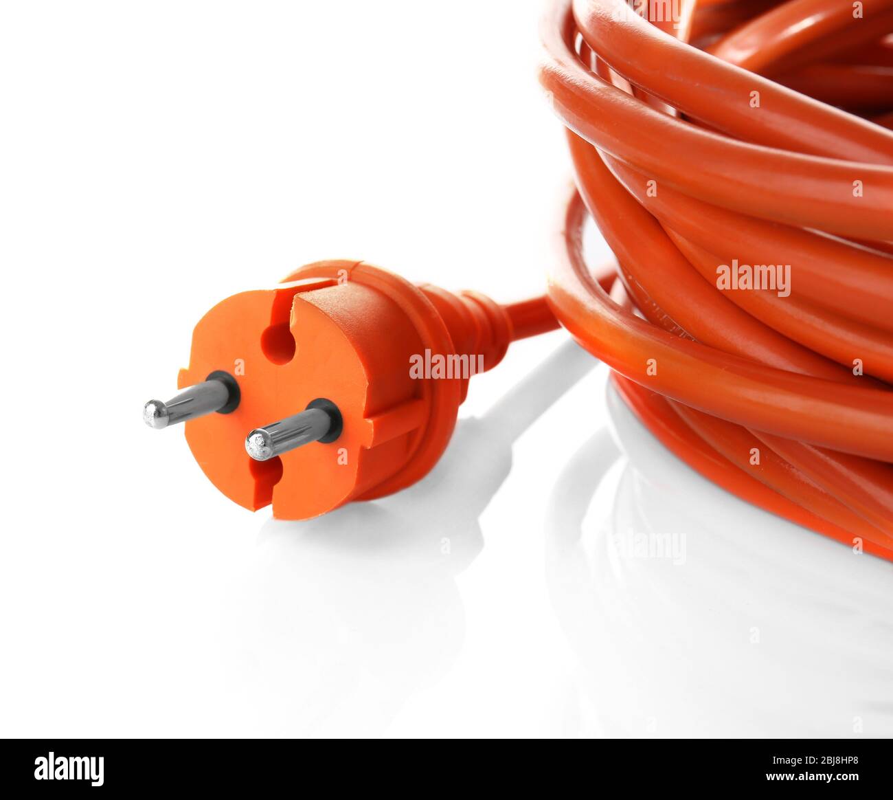 Orange rolled extension isolated on white Stock Photo - Alamy
