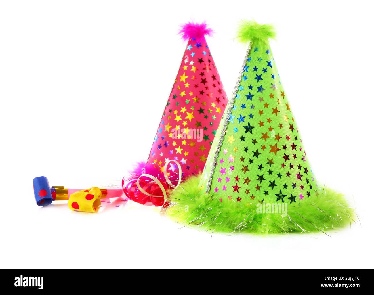 Two party hats on white background Stock Photo - Alamy