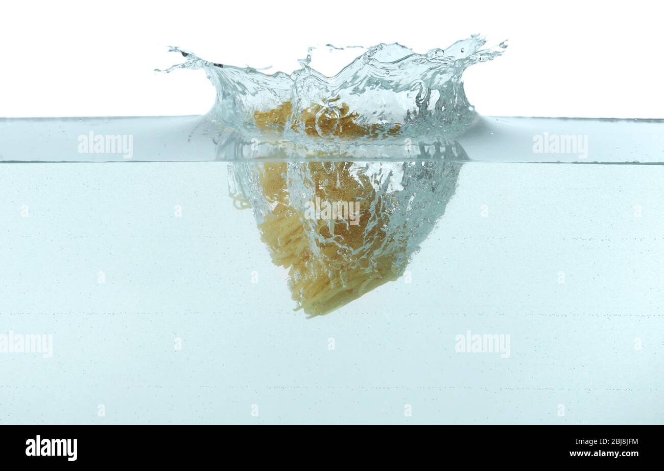 Noodles falling in water Stock Photo - Alamy