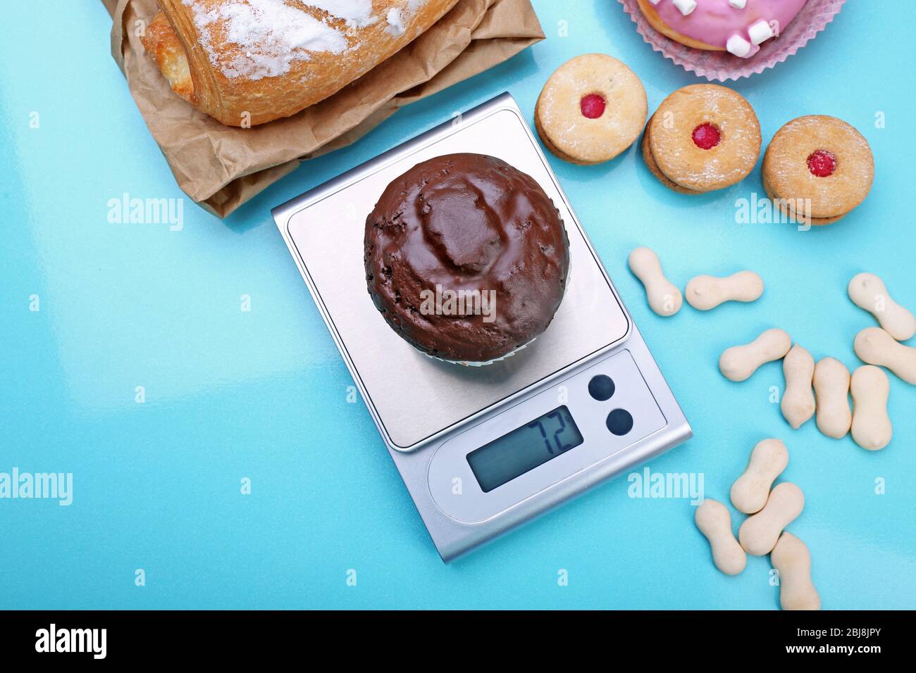 Weighing scale chocolate hi-res stock photography and images - Alamy