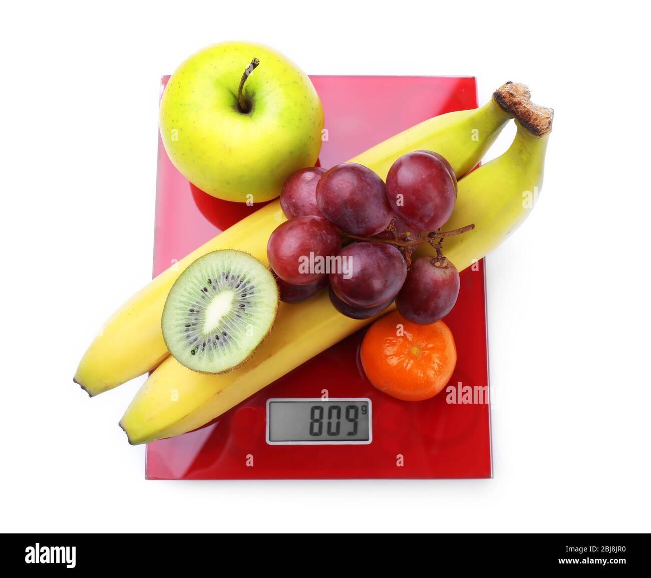 Fruits on weighing scale Cut Out Stock Images & Pictures - Alamy