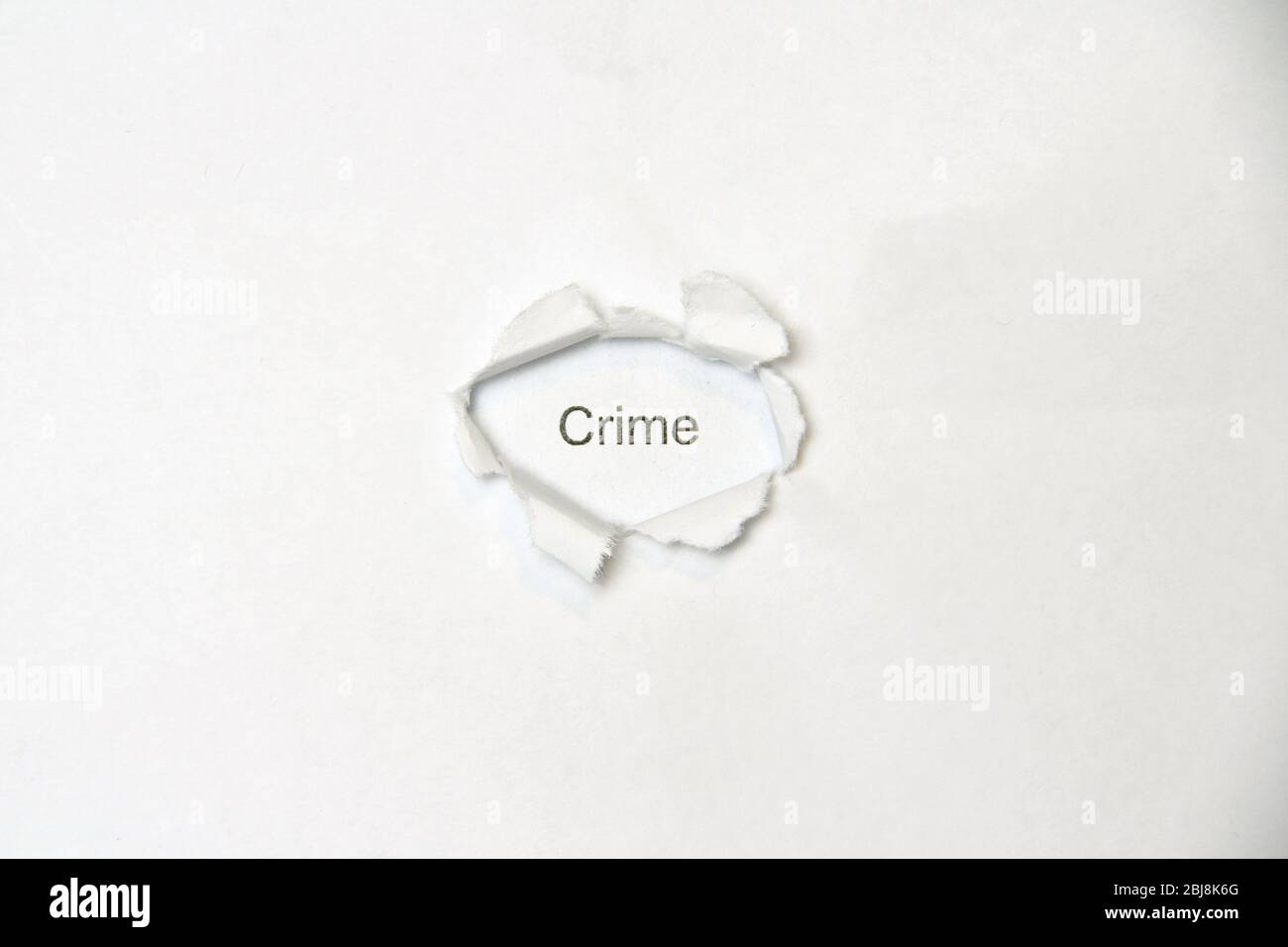 Word crime on white isolated background, the inscription through the ...
