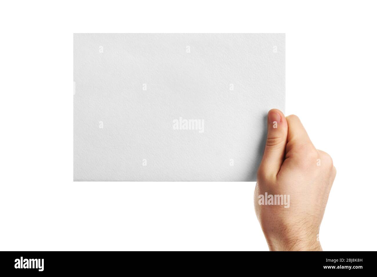 Male hand holding clean sheet of paper, isolated on white Stock Photo ...