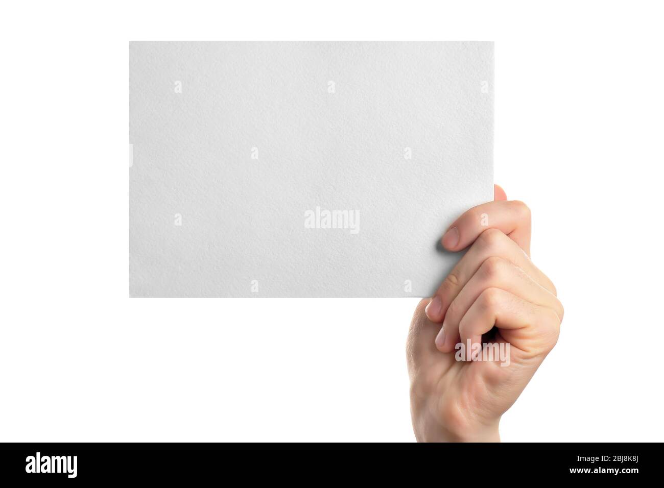 Male hand holding clean sheet of paper, isolated on white Stock Photo ...