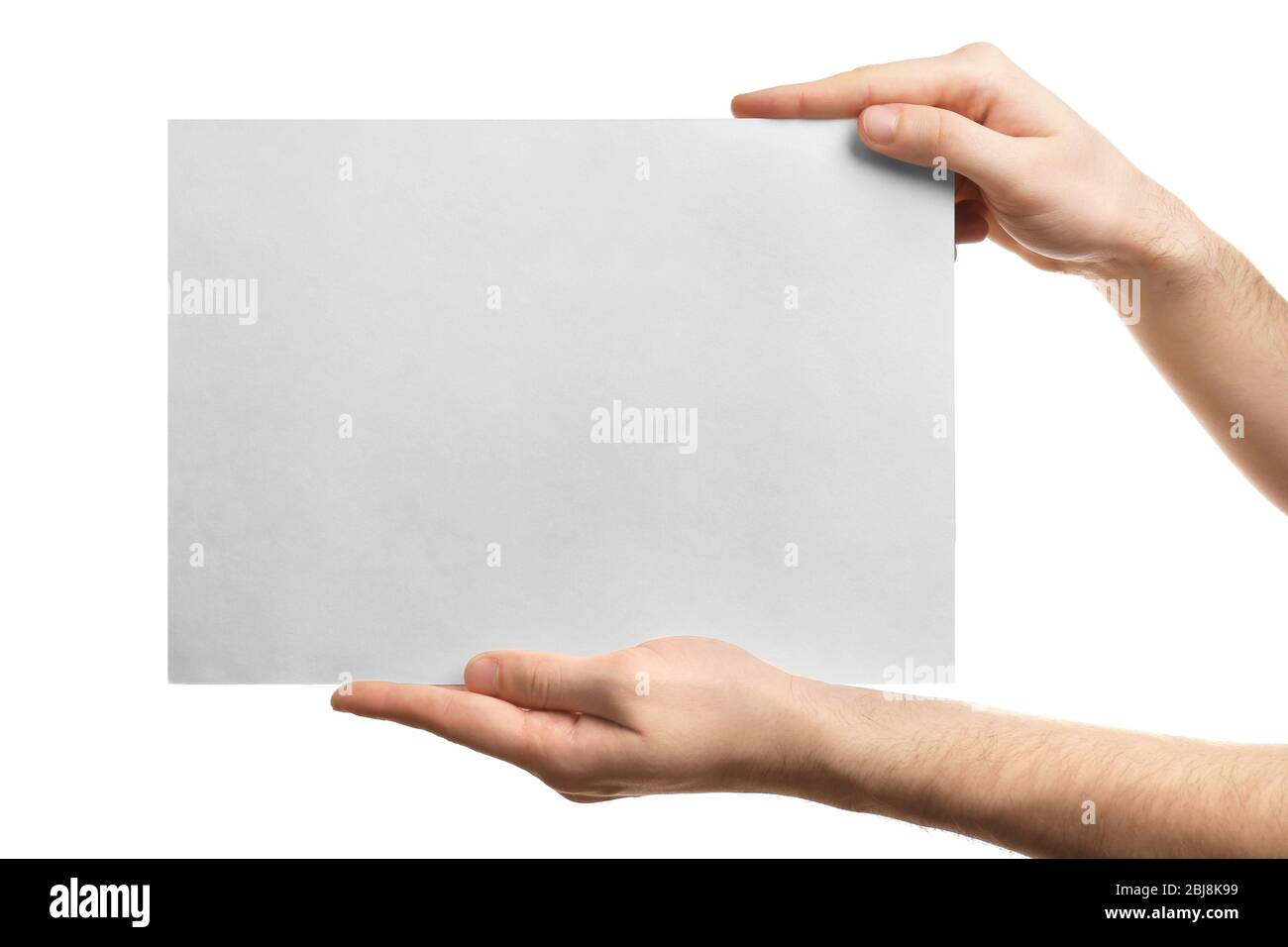 Male hands holding clean sheet of paper, isolated on white Stock Photo ...