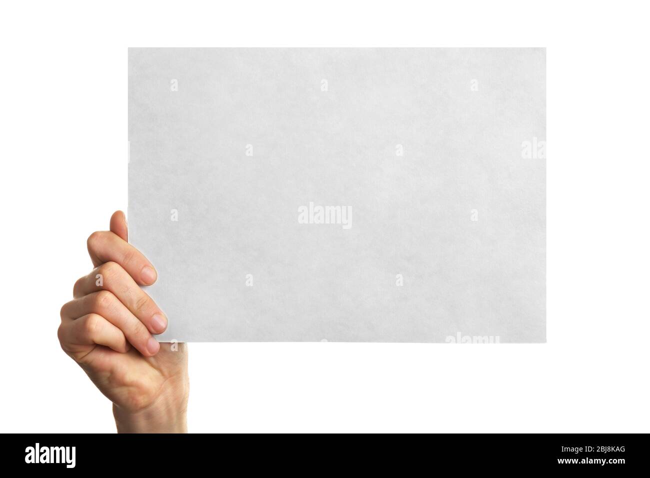 Male hand holding clean sheet of paper, isolated on white Stock Photo ...