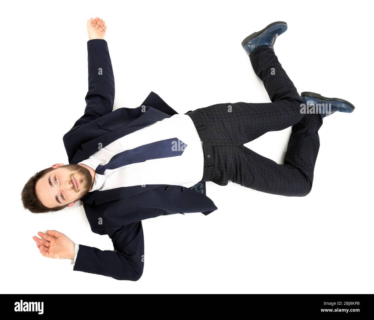 Tired guy lying on floor hi-res stock photography and images - Alamy