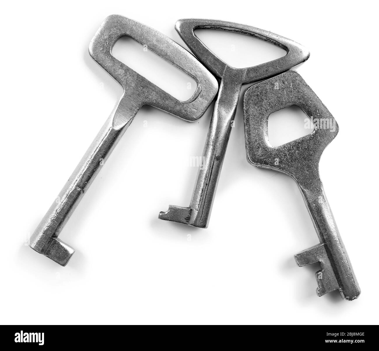 Three keys, isolated on white Stock Photo - Alamy