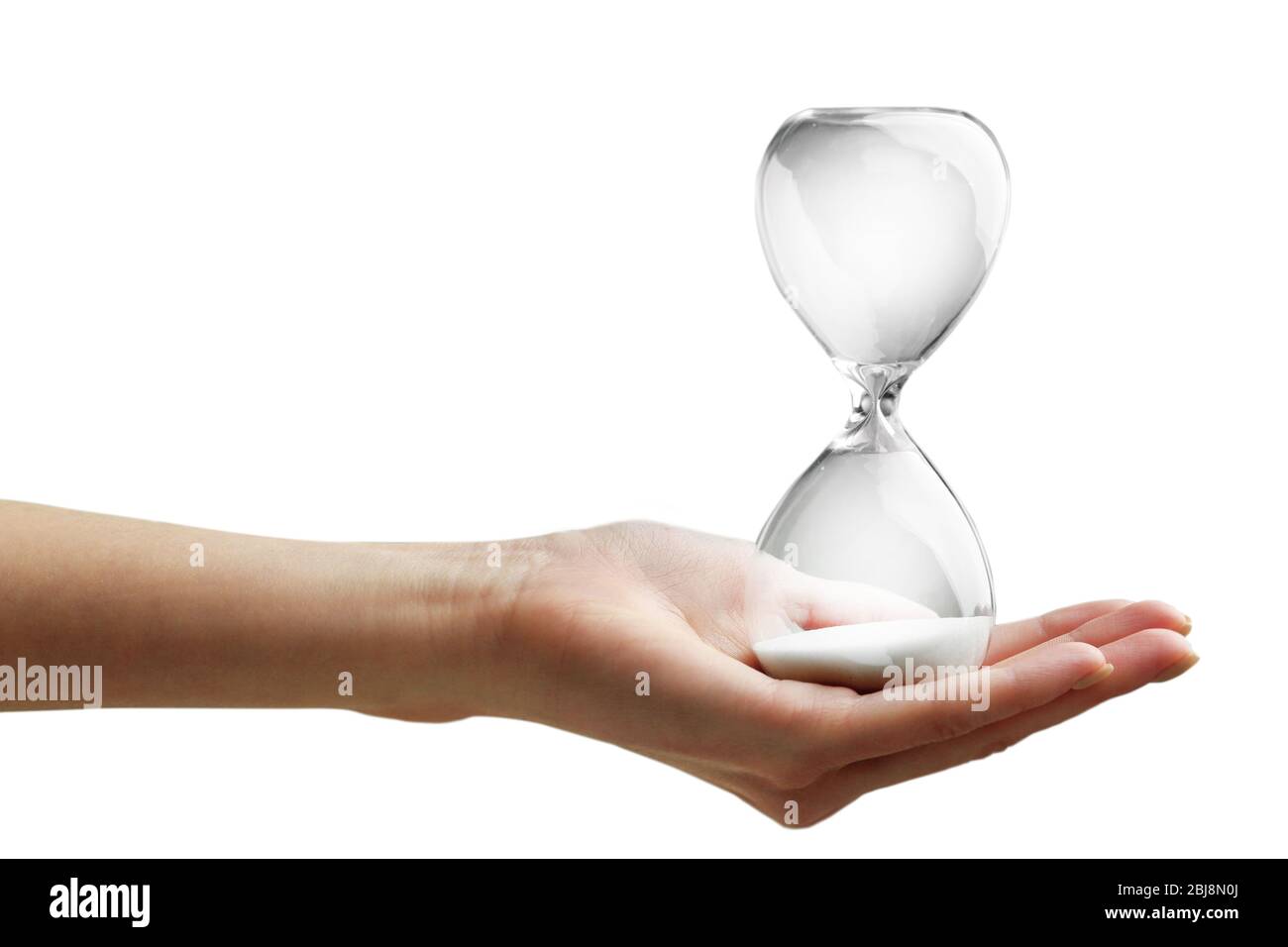 Hand holding hourglass Cut Out Stock Images & Pictures - Alamy