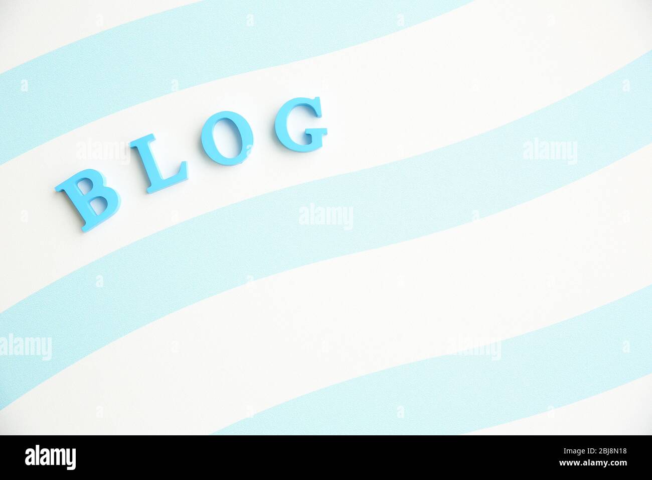 Word BLOG from blue letters on striped background Stock Photo - Alamy