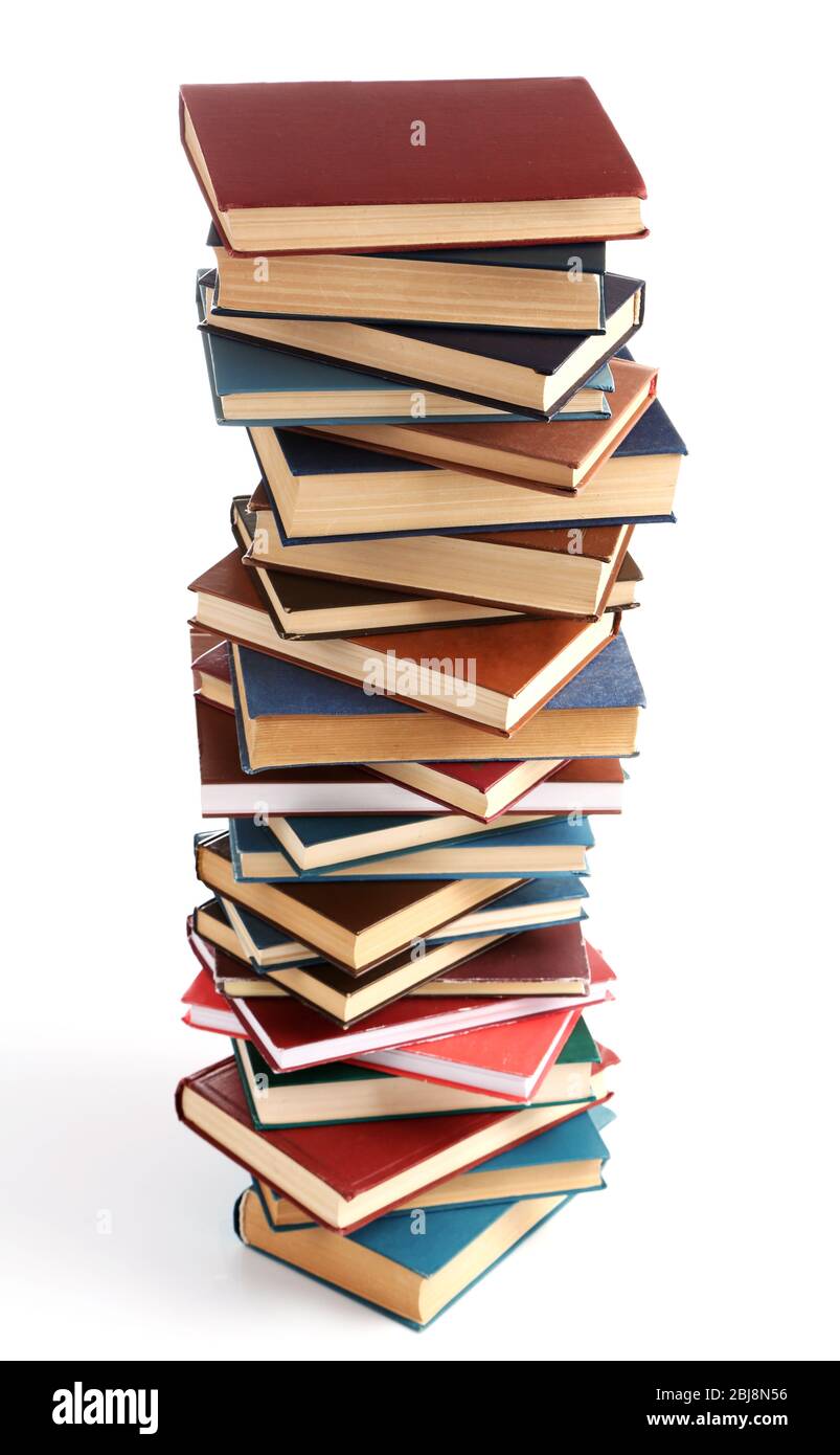 High stack of books, isolated on white Stock Photo - Alamy