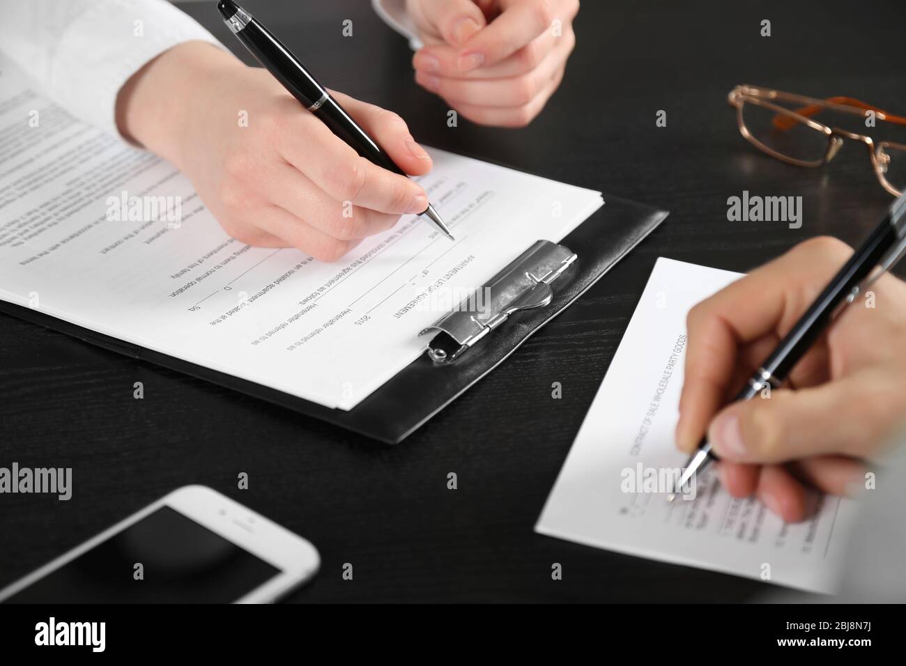 Human hands working documents hi-res stock photography and images - Alamy