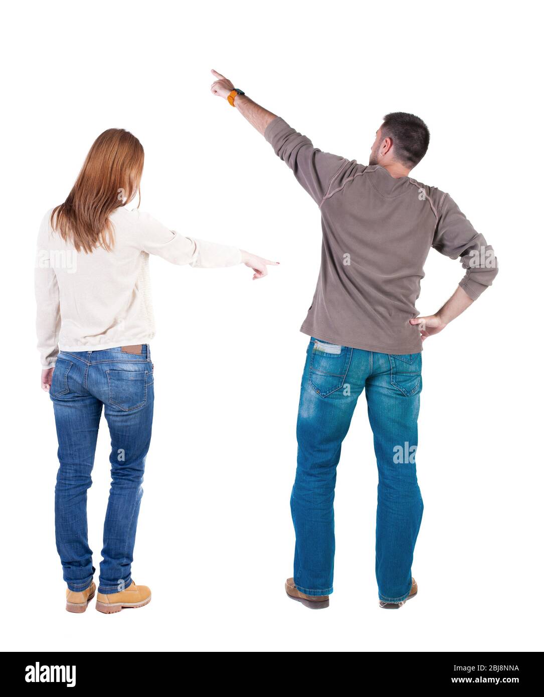Back view of couple in sweater pointing. Rear view people collection ...