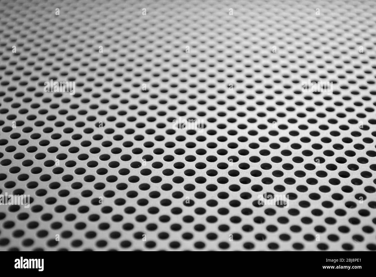 Metal texture - round wholes/ dots Stock Photo - Alamy